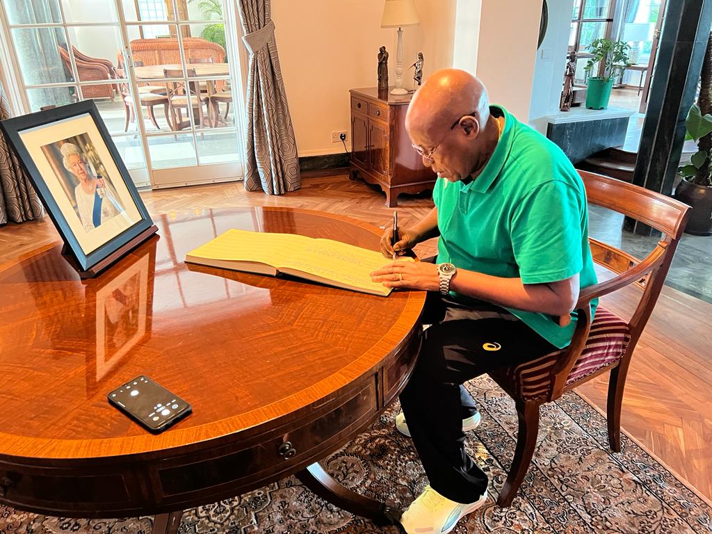 Secretary General of TOC - Filbert Bayi signing the book of condolences ...